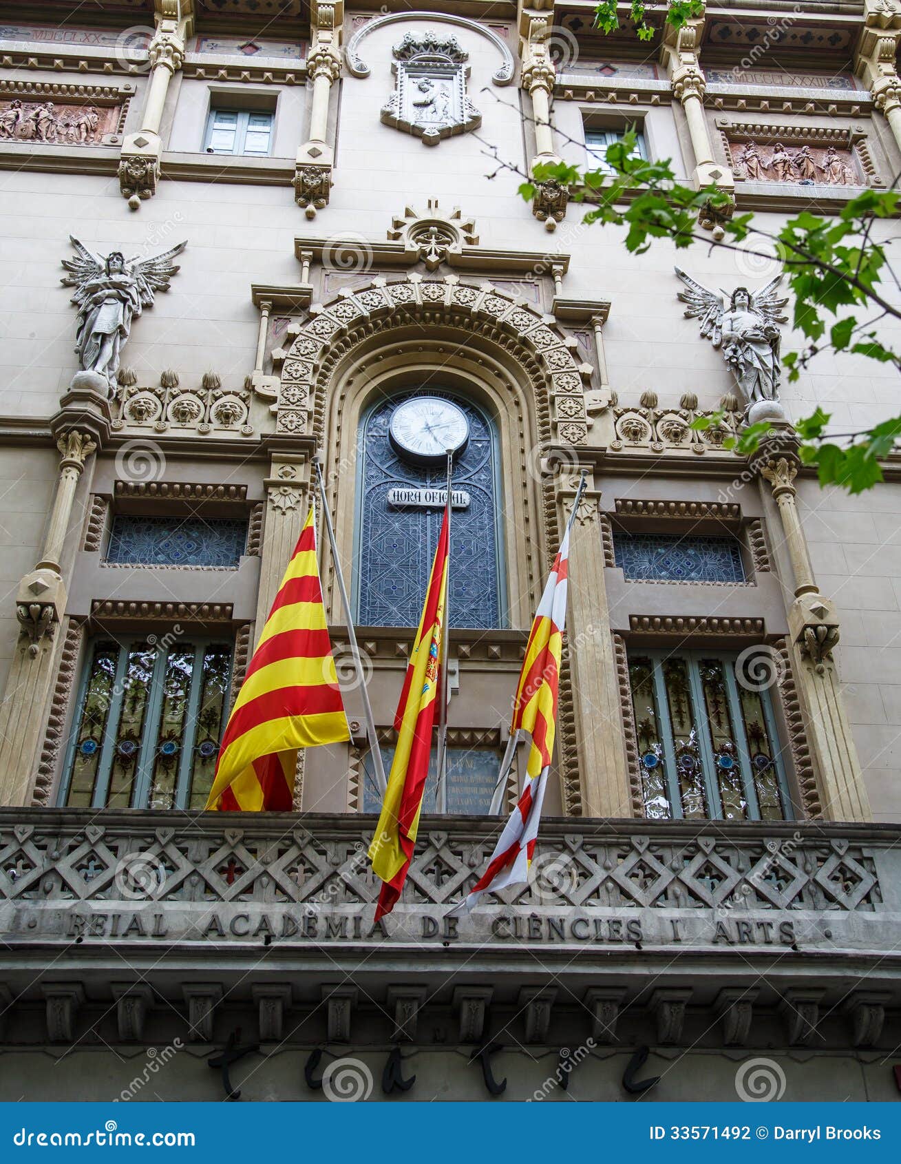 Flags Under Spanish Clock stock photo. Image of clock - 33571492