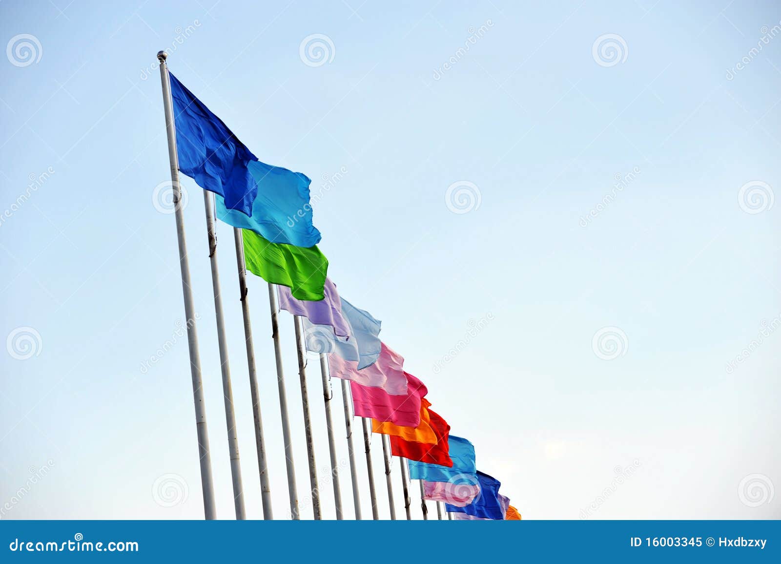 Flags in the wind stock image. Image of decorative, blue - 16003345