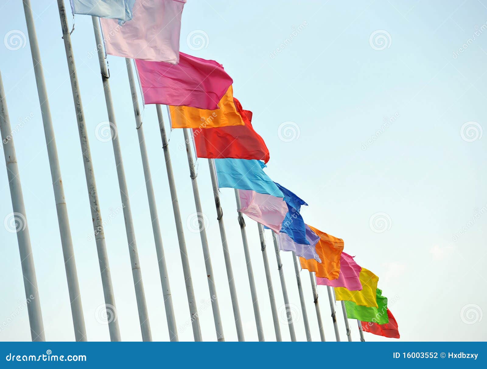 Flags in the wind stock photo. Image of carnival, blue - 16003552