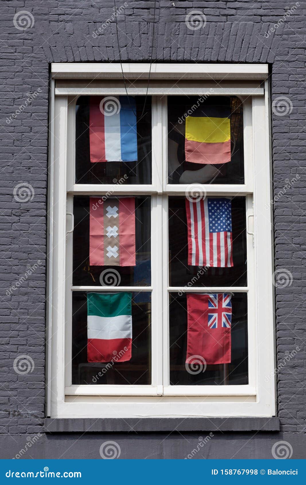 Flags in Window stock photo. Image of holland, glass - 158767998