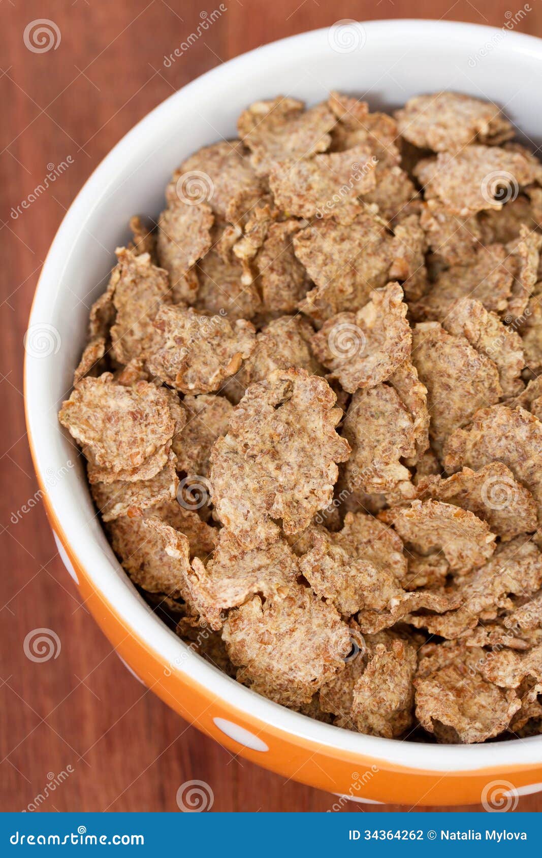 Flakes in orange bowl stock photo. Image of cereal, dietary - 34364262