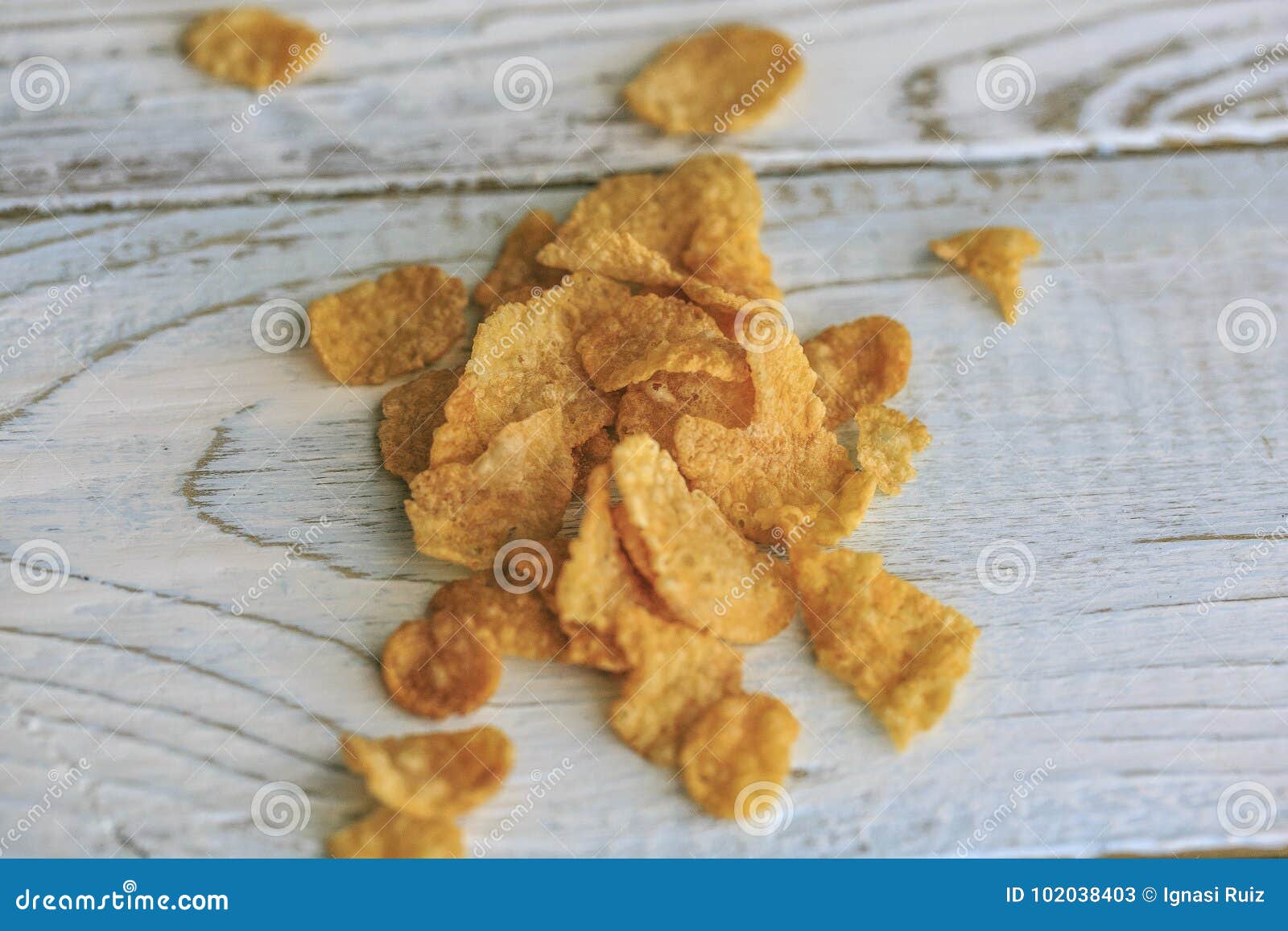 Flakes in a wooden table stock image. Image of sultanas - 102038403
