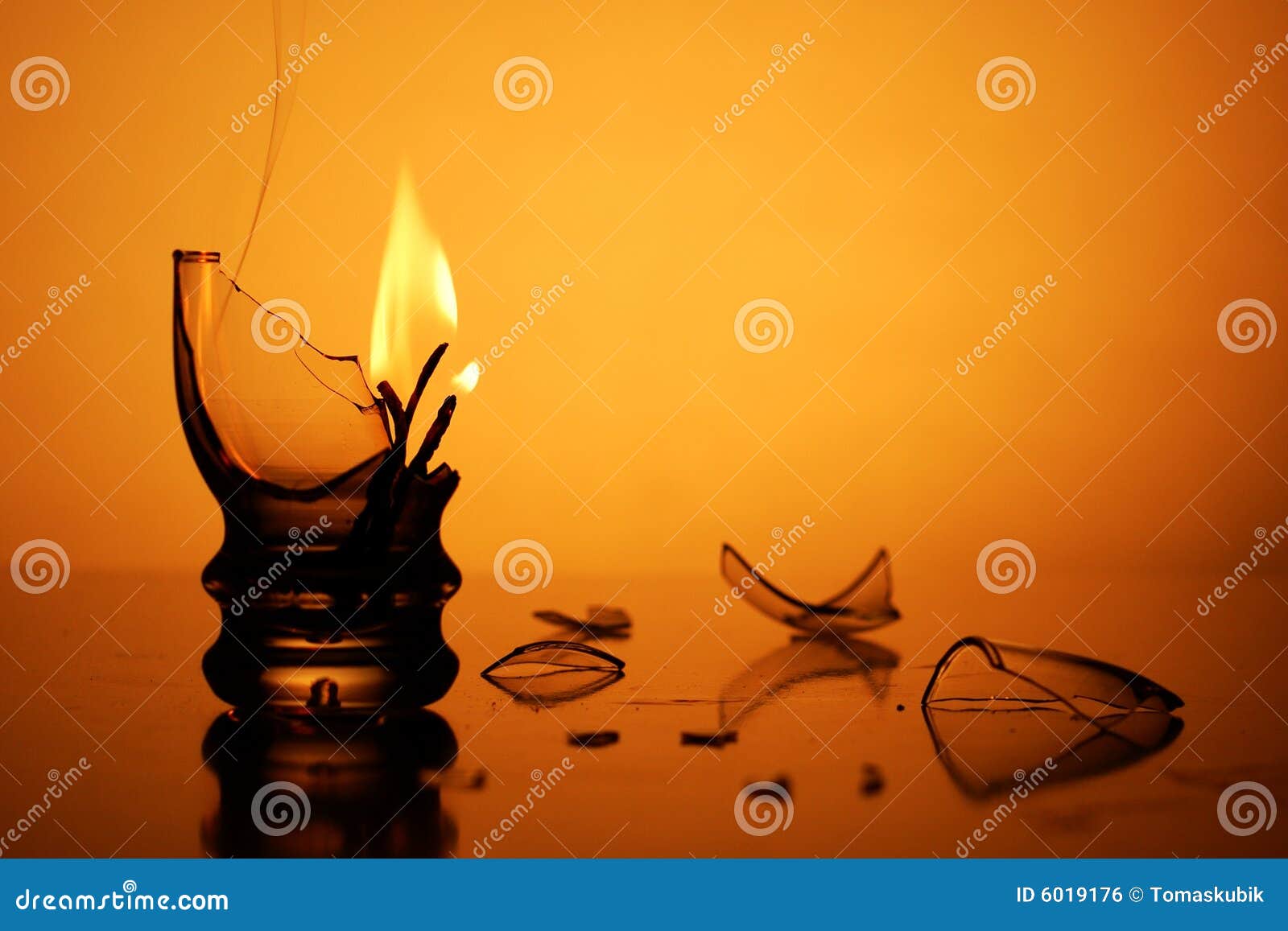 Flame in broken glass stock photo. Image of abstract, reflex - 6019176