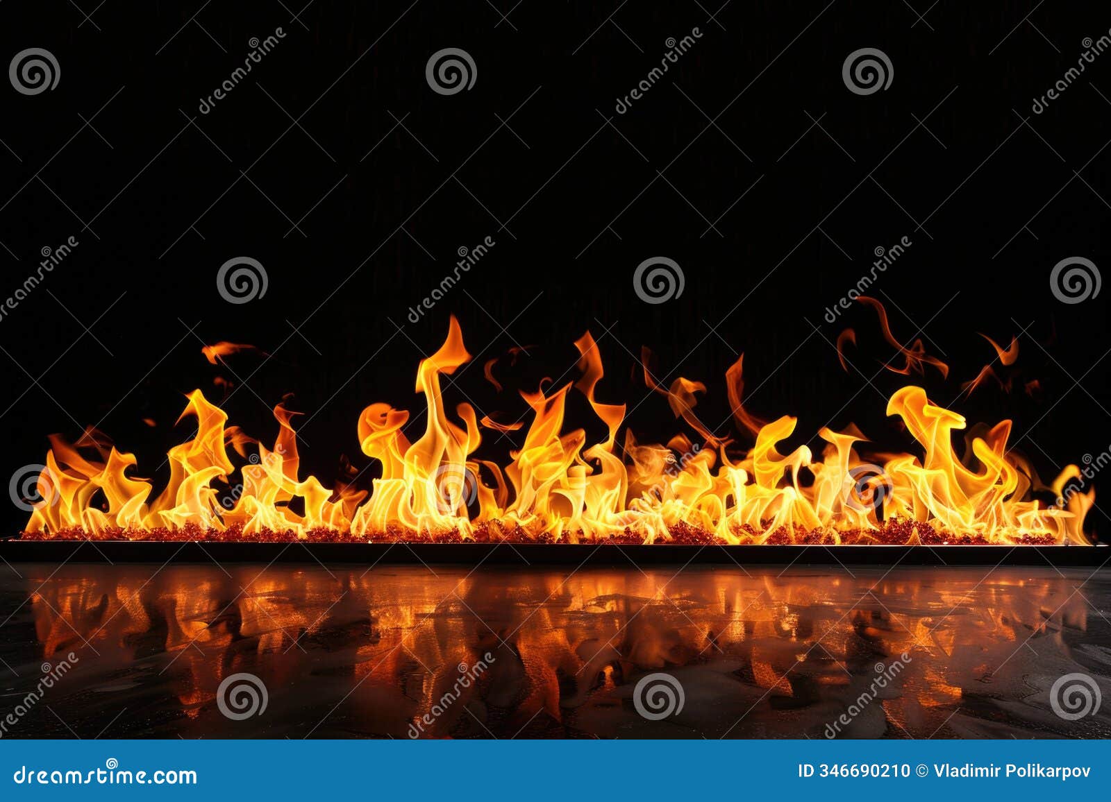 A Flame Burns Brightly on a Dark or Charred Surface Stock Photo - Image ...