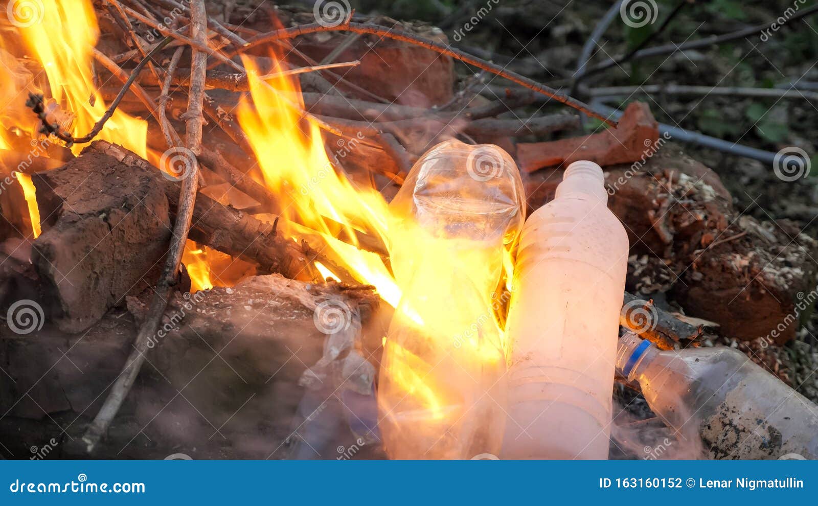 Flame Fire and Smoke Burning Garbage Waste of Plastic To Air Pollution ... Flame Fire and Smoke Burning Garbage Waste of Plastic To Air Pollution ...