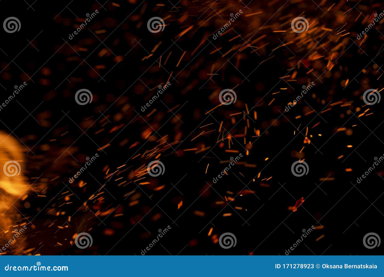 Flame of Fire with Sparks on a Black Background Stock Image - Image of ...