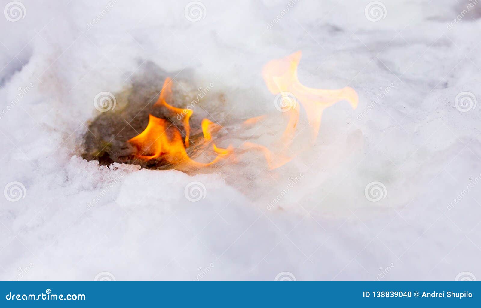 Flame of Fire on White Snow in Winter Stock Photo - Image of texture ...