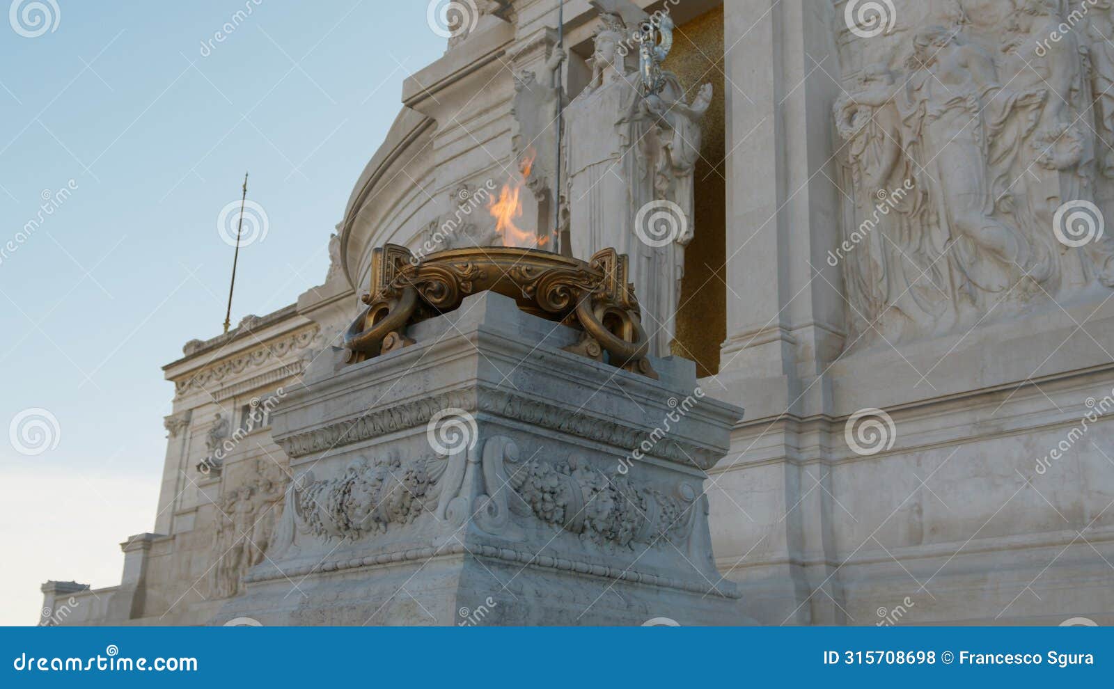 The Flame of Glory Burning Under a Statue in Rome Stock Photo - Image ...