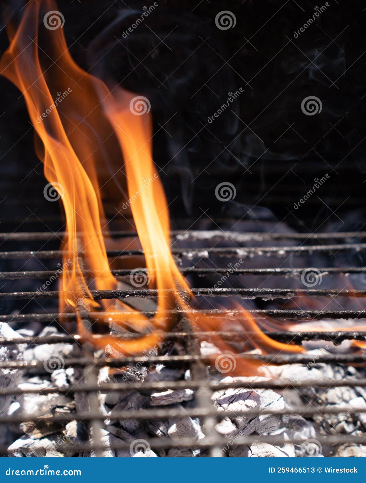 Flame Going through the Grate of a Barbecue Grill Stock Image - Image ...