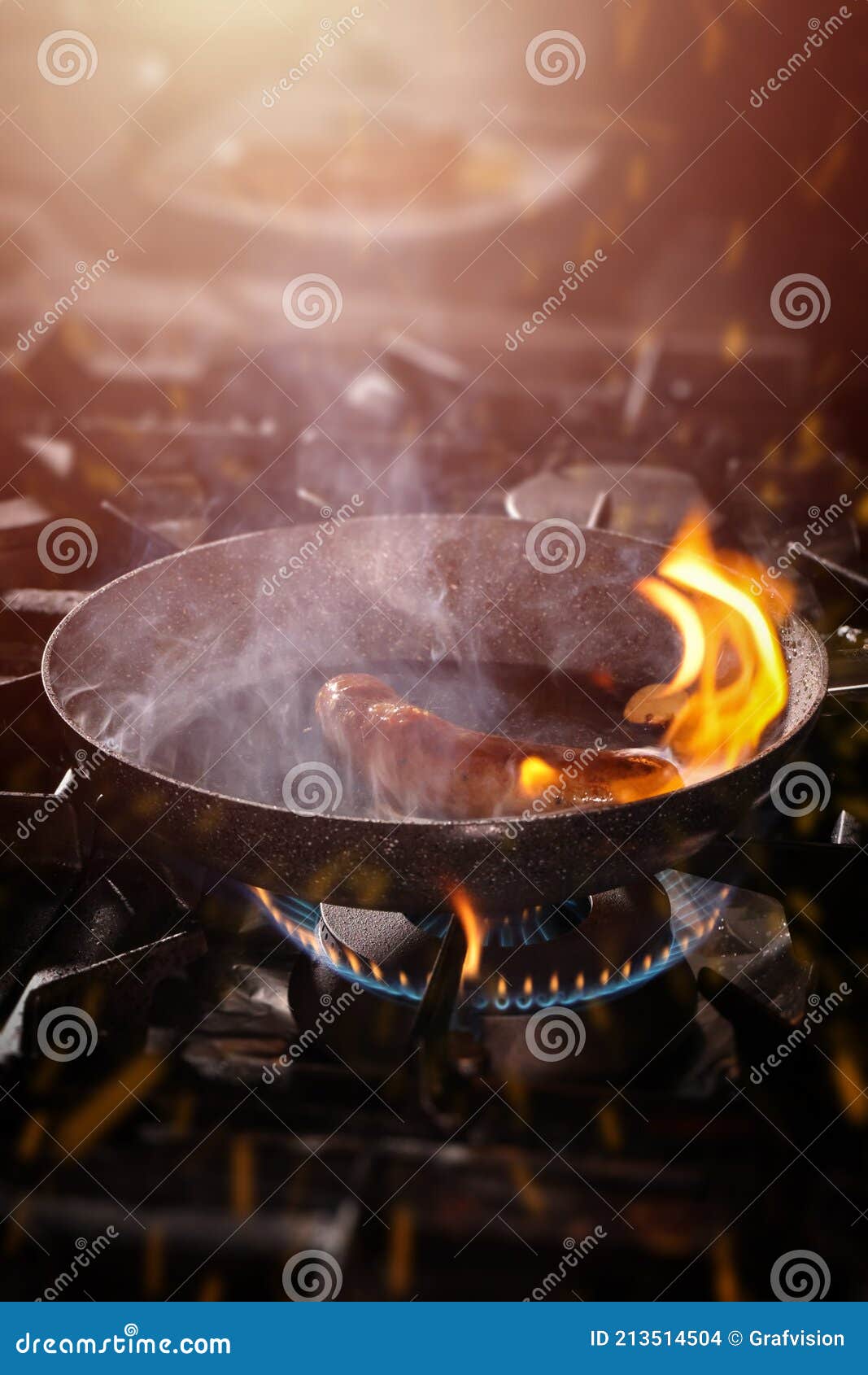 Flame in the pan stock photo. Image of lunch, dinner - 213514504