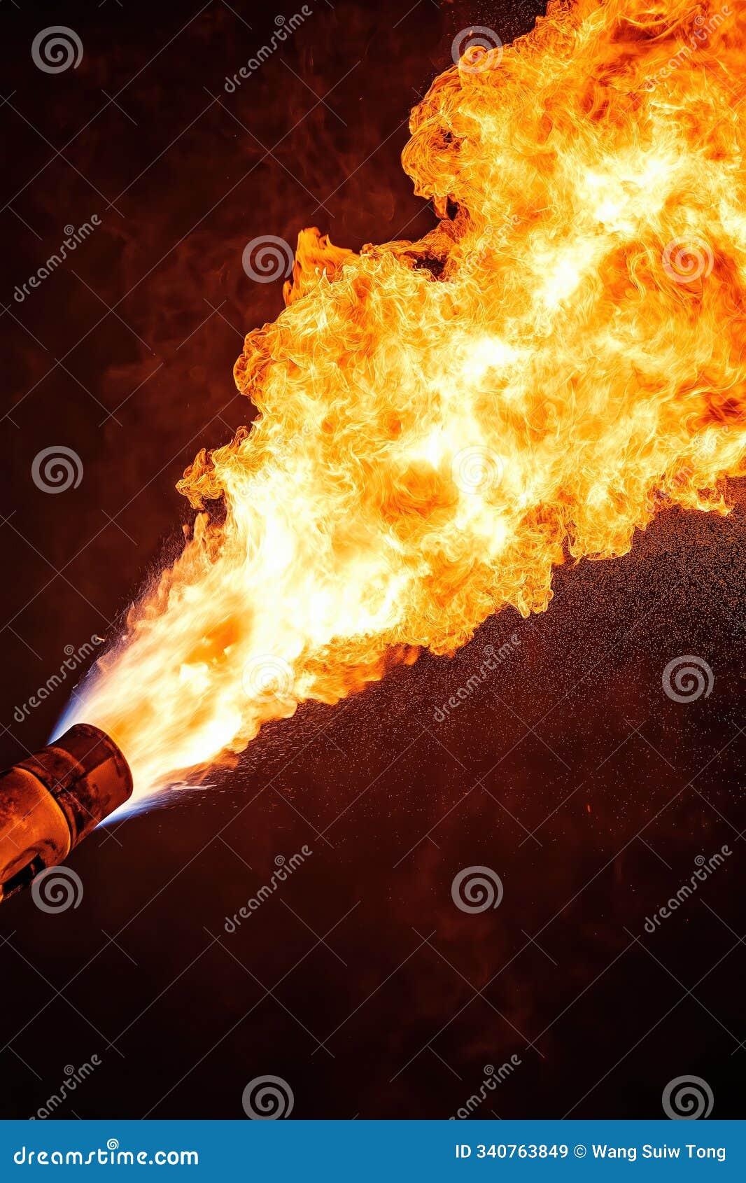 Flame Shooting from a Torch during a Performance in a Darkened ...