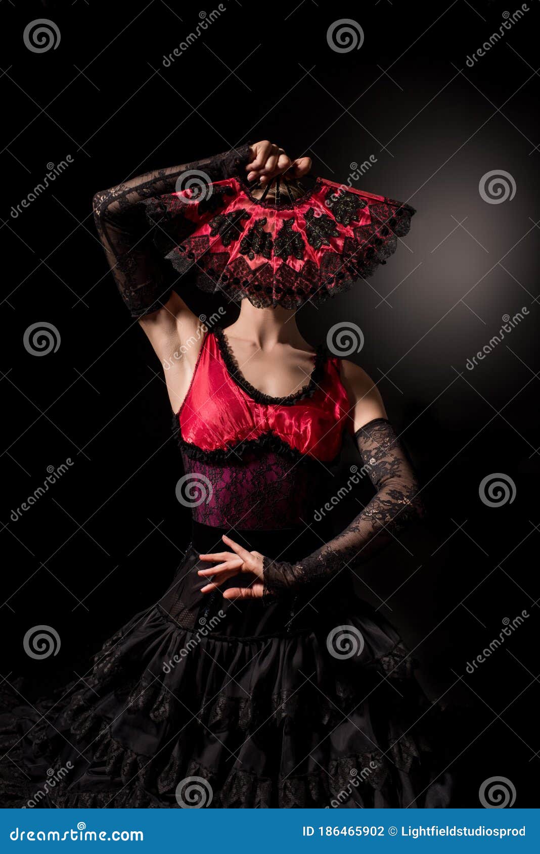 Flamenco Dancer Covering Face with Fan Stock Photo - Image of ...