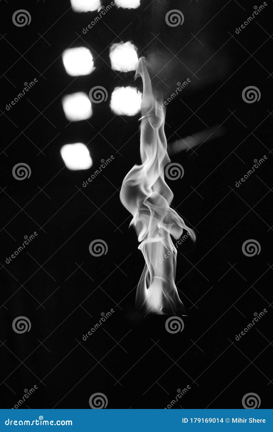 Flames of Fire in Black and White with Lights in the Background Stock ...