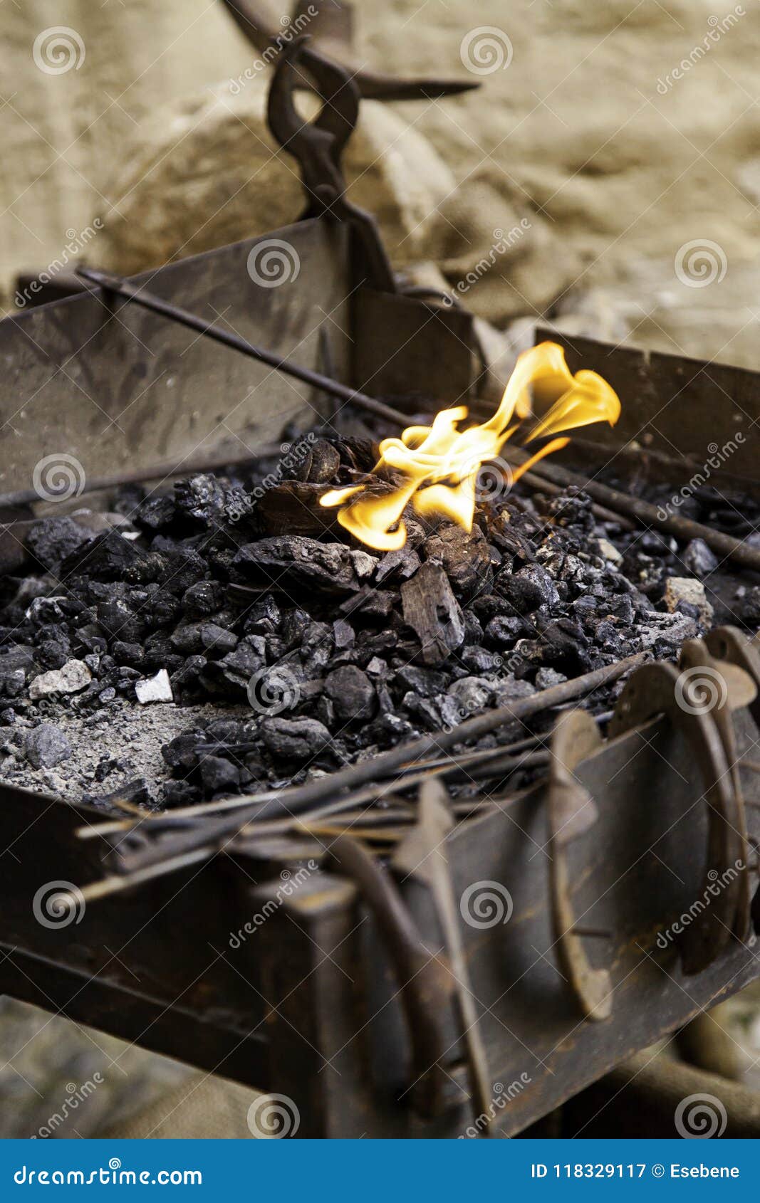 Flames of fire in a forge stock image. Image of burning - 118329117