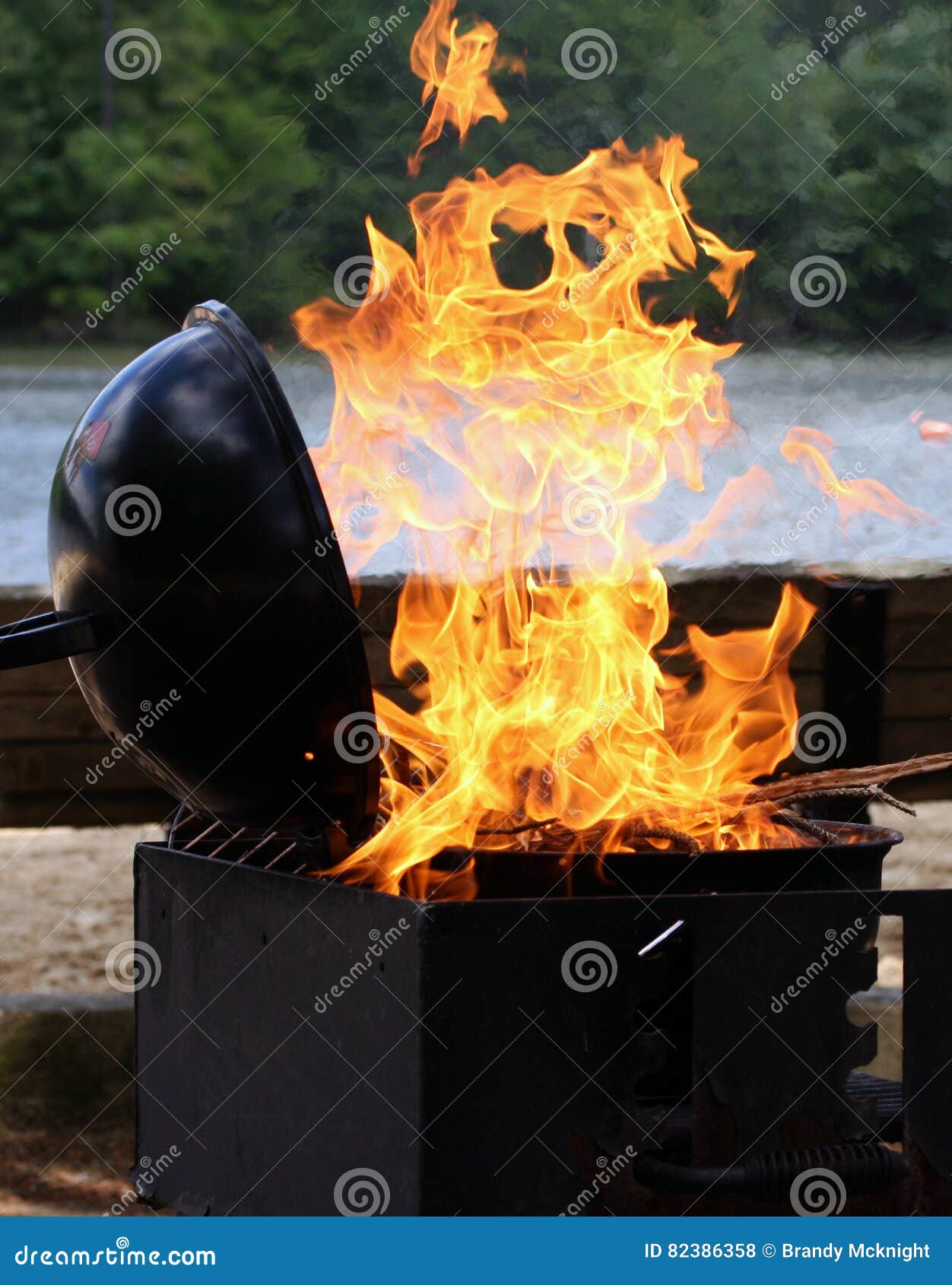 Flames Shooting from Grill stock photo. Image of grilling - 82386358