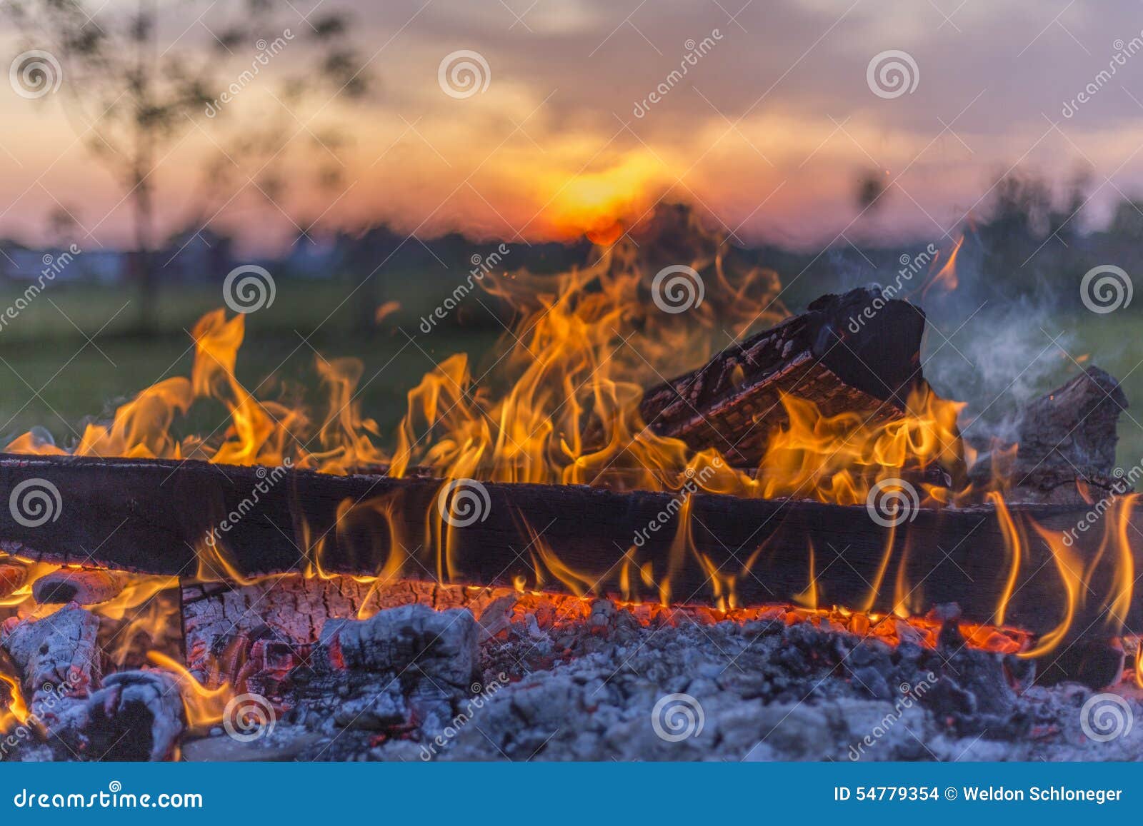 Flaming Campfire and Ohio Sunset Stock Photo - Image of burn, flame ...
