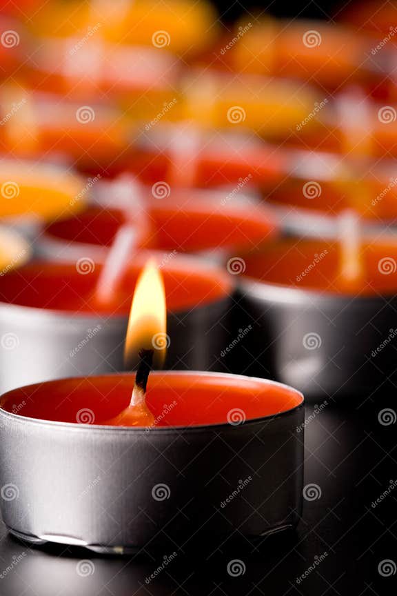 Flaming candles stock image. Image of dark, gold, macro - 14270111