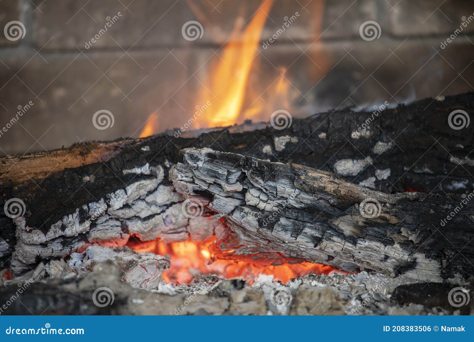 Flaming Fire in an Extinguished Stone Fireplace, Horizontal Stock Photo ...