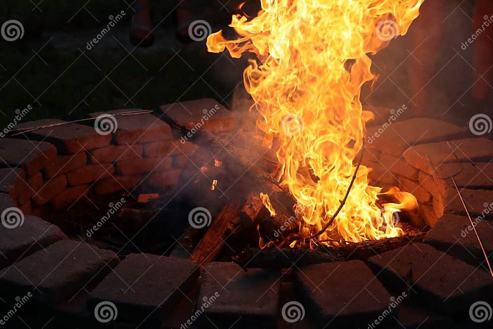 Flaming Fire in a Firepit Outdoors Stock Image - Image of grill, fire ...