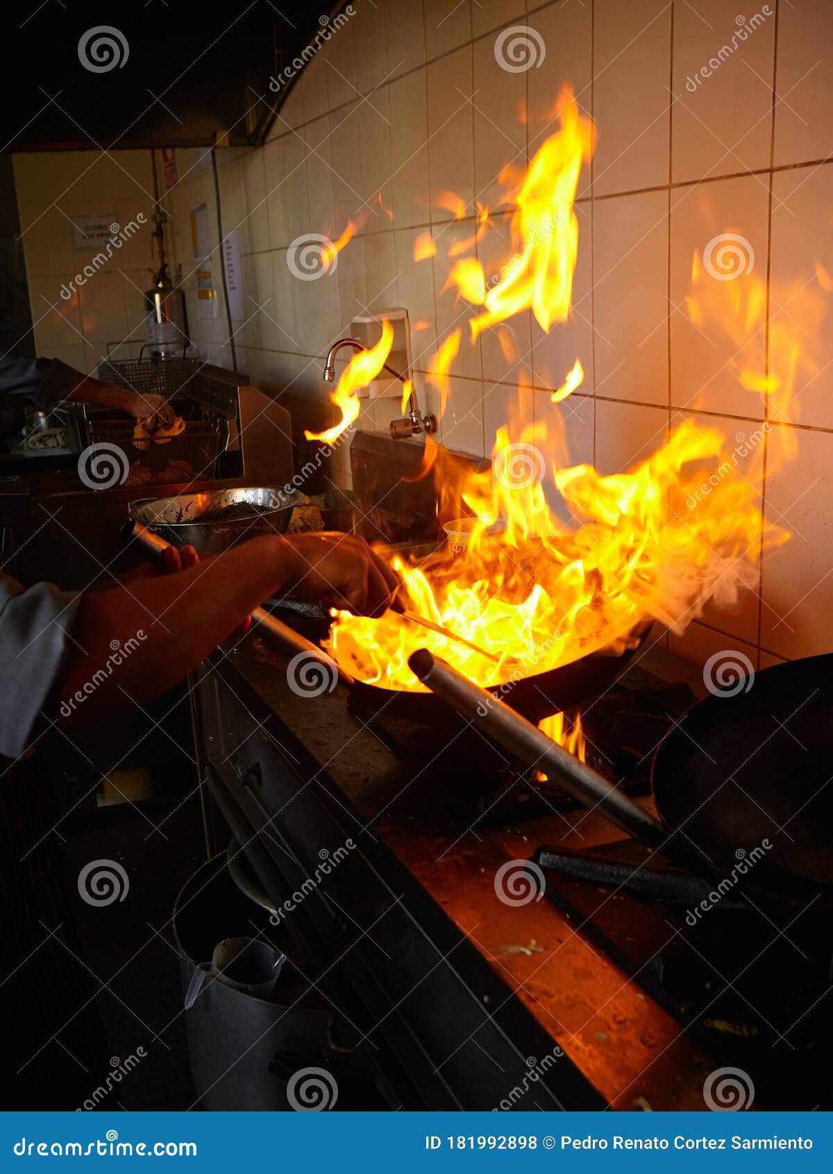 Flaming Kitchen Using a Big Wok To Prepare Peruvian Food Stock Photo ...