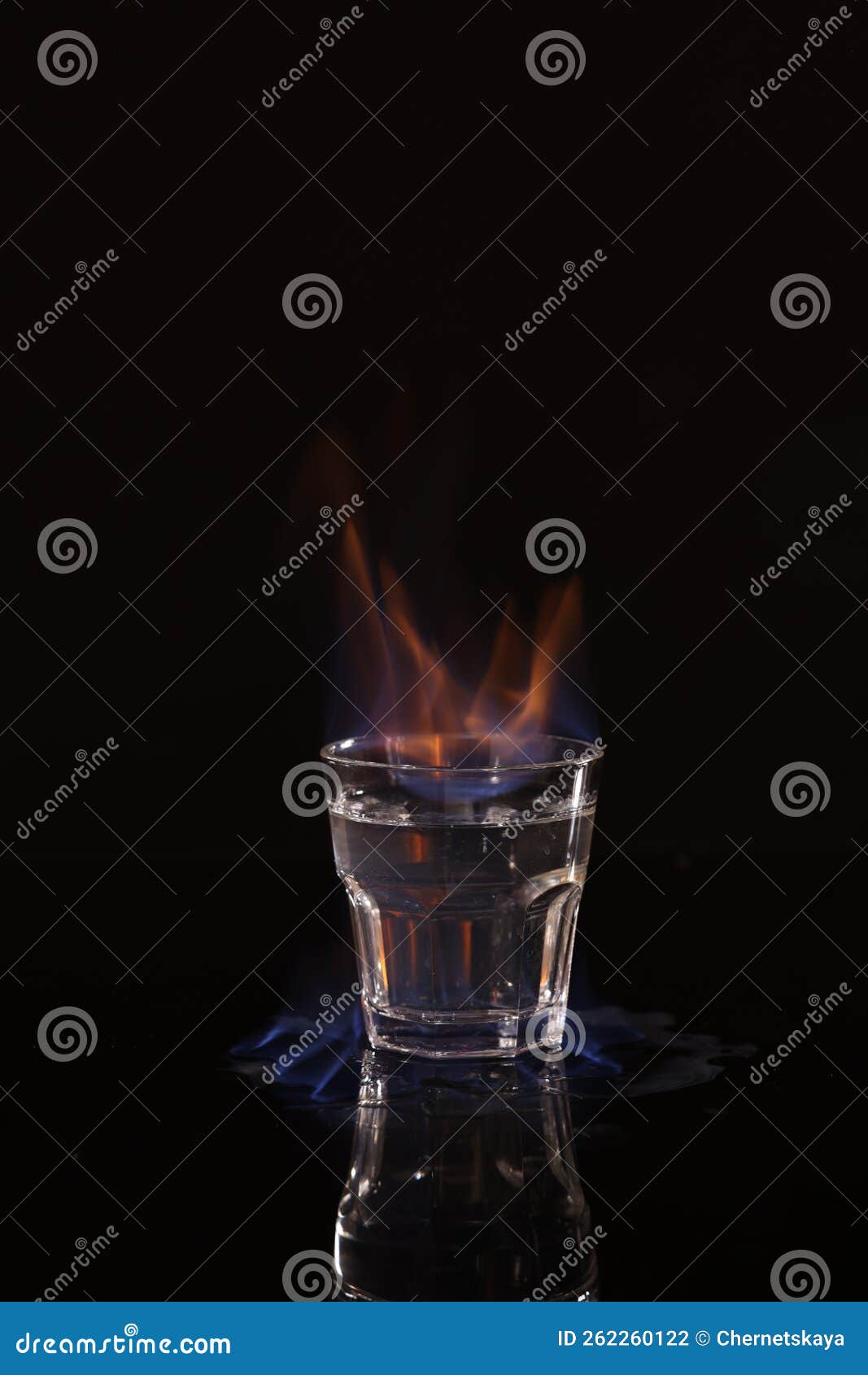 Flaming Vodka in Shot Glass on Black Background Stock Photo - Image of ...