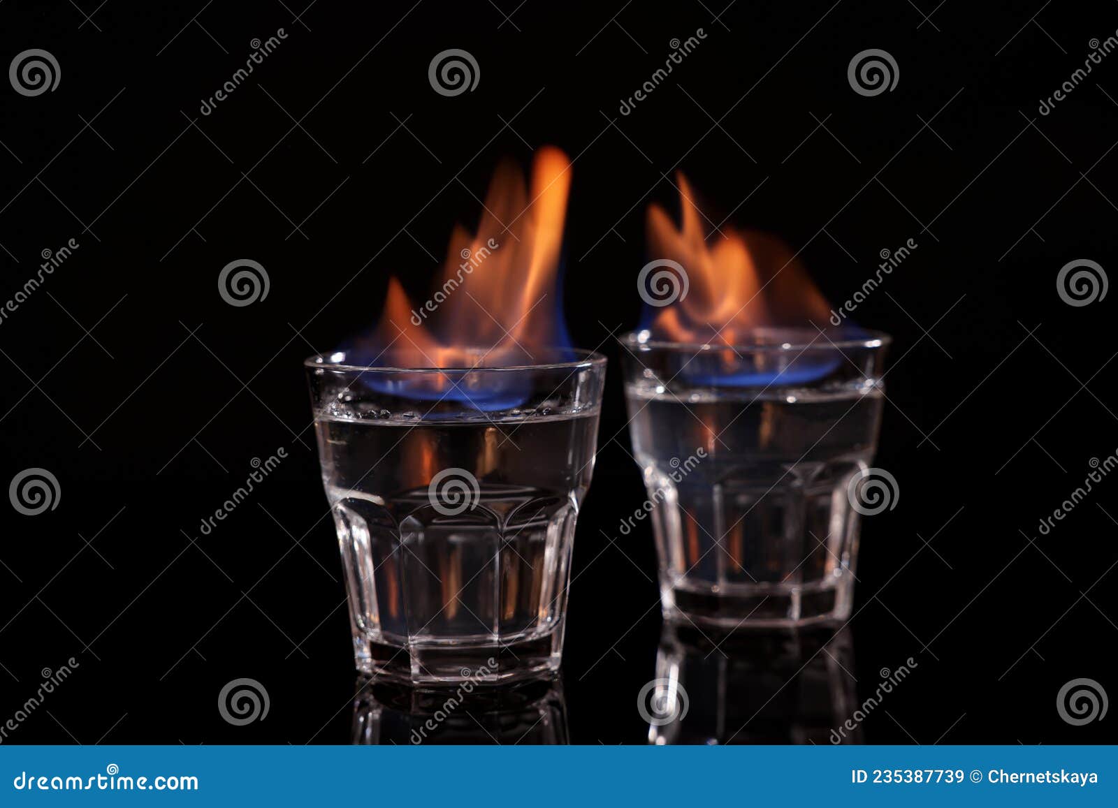 Flaming Vodka in Shot Glasses on Black Background Stock Image - Image ...