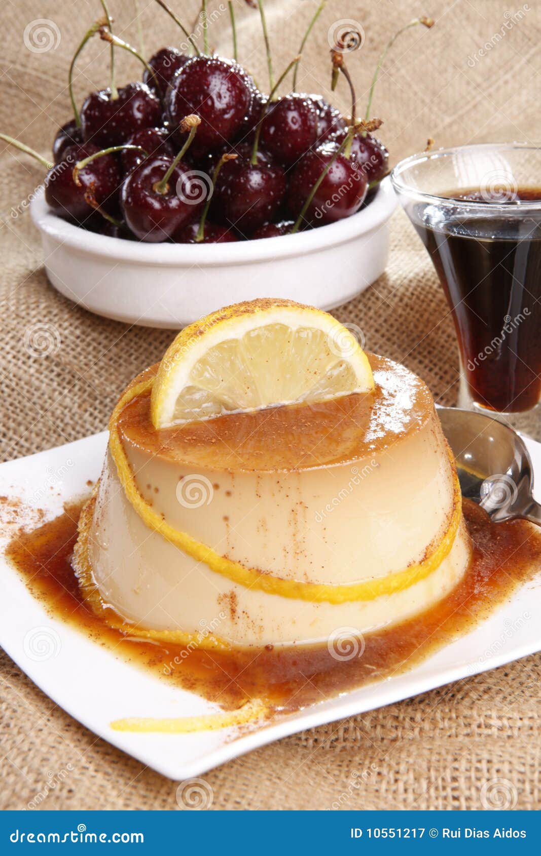 Flan and cherries stock image. Image of plate, drop, brown - 10551217
