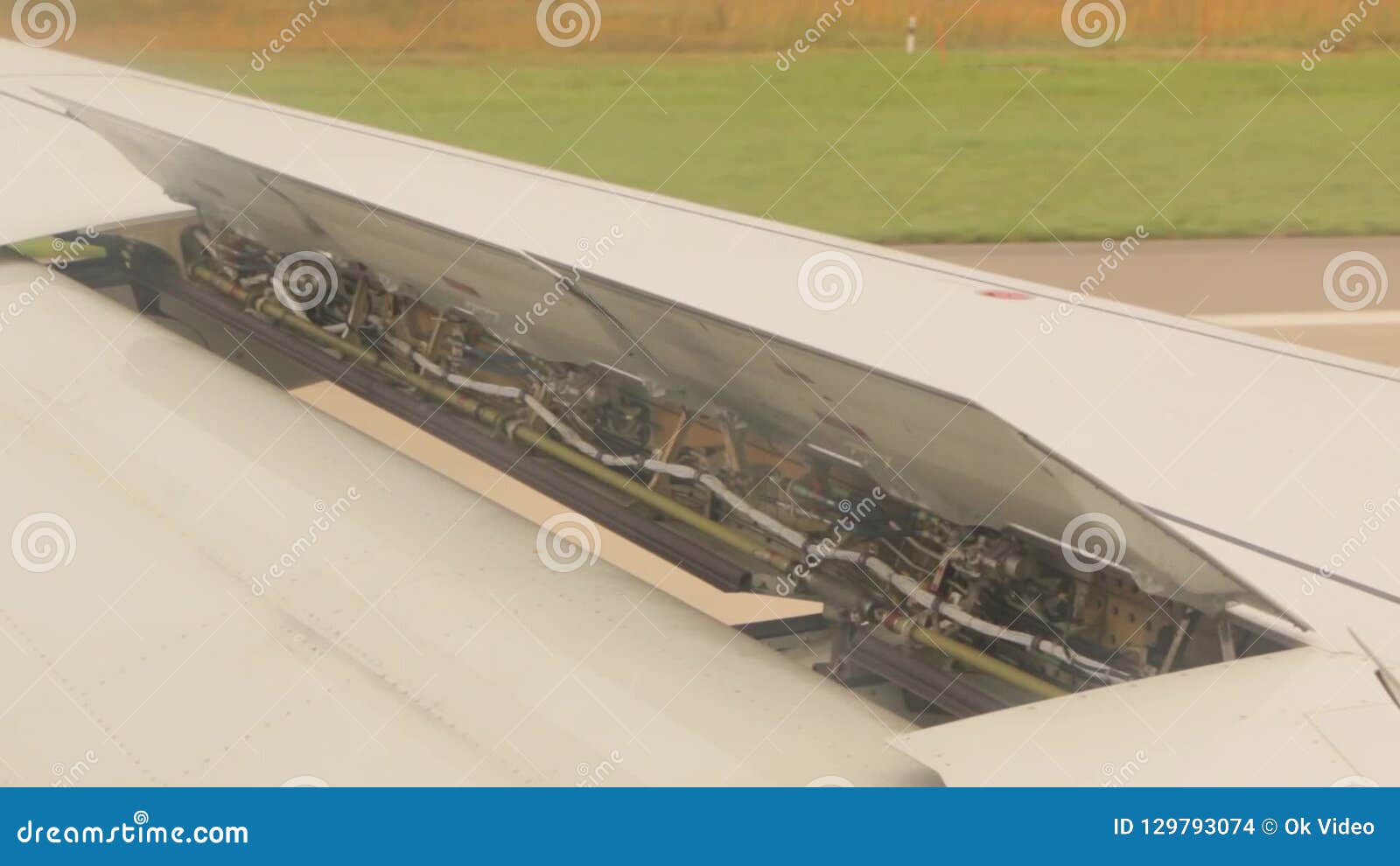 Flaps airplane landing stock footage. Video of flaps - 129793074