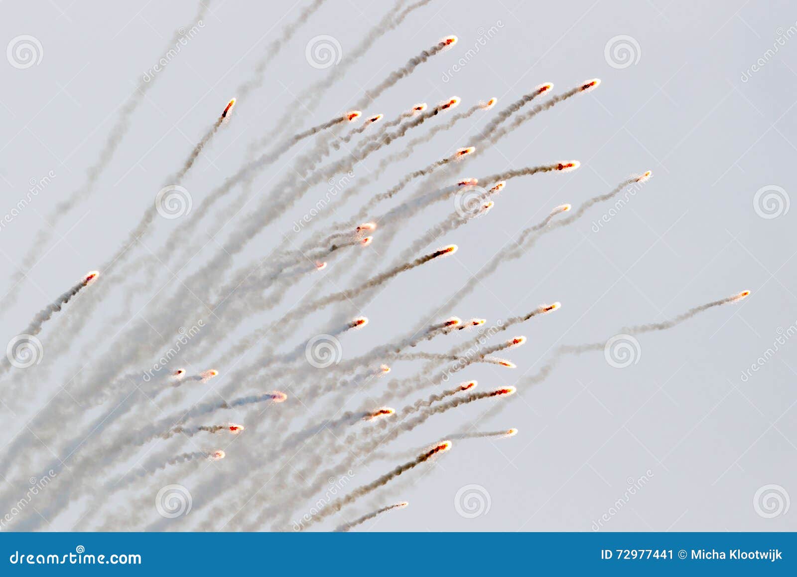 Flares fired from a jet editorial photo. Image of smoke - 72977441