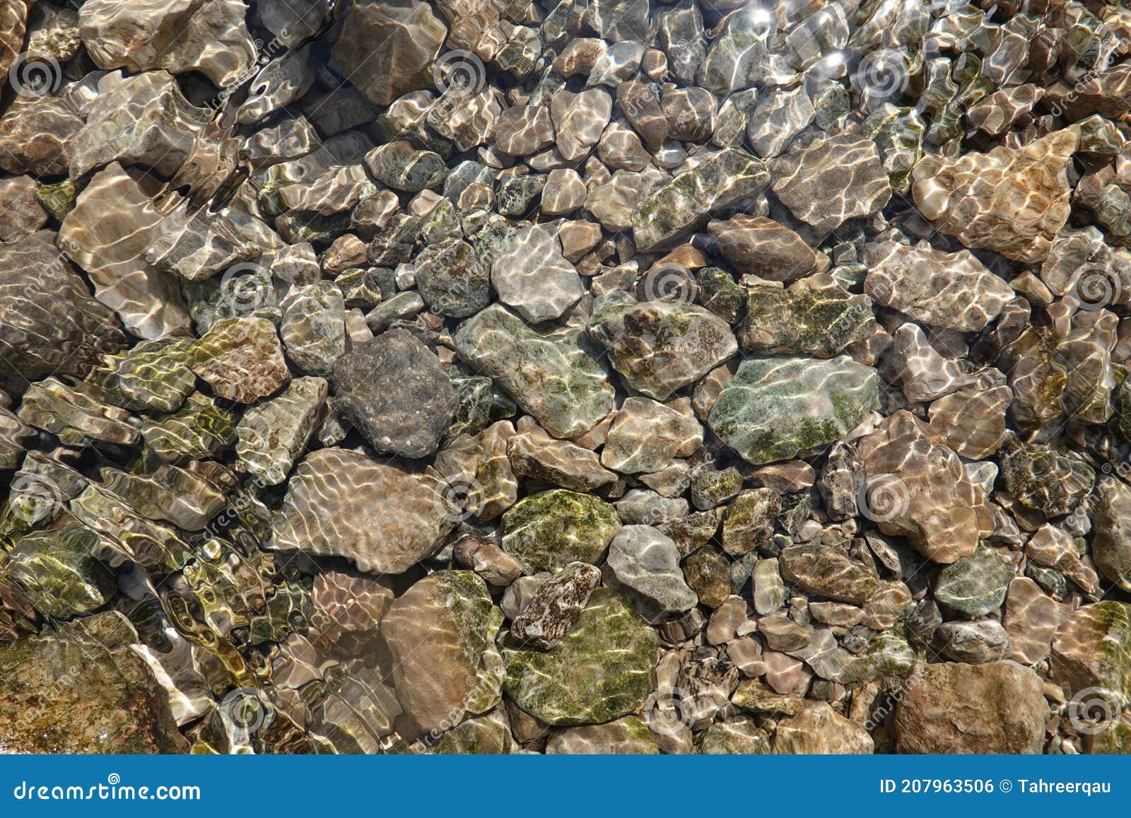 Flaring Light on Stones in Water Stock Photo - Image of spring, stones ...