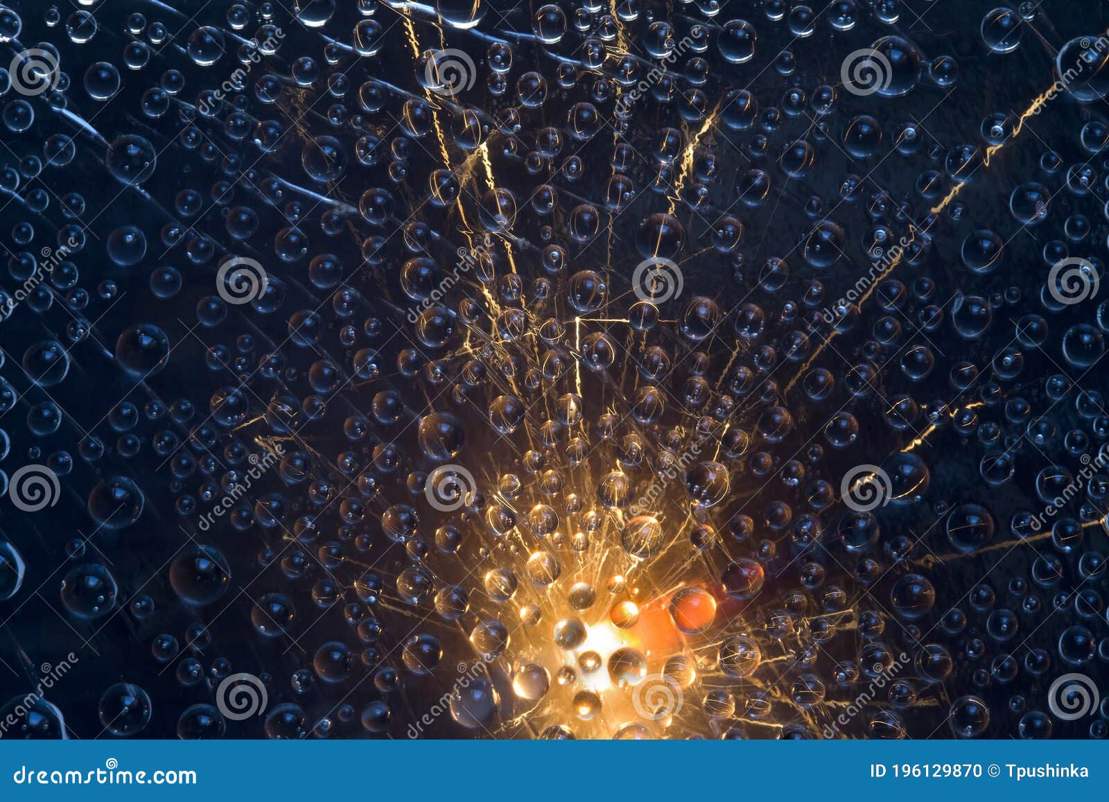 Flash of Light is Reflected in Transparent Water Droplets Against the ...