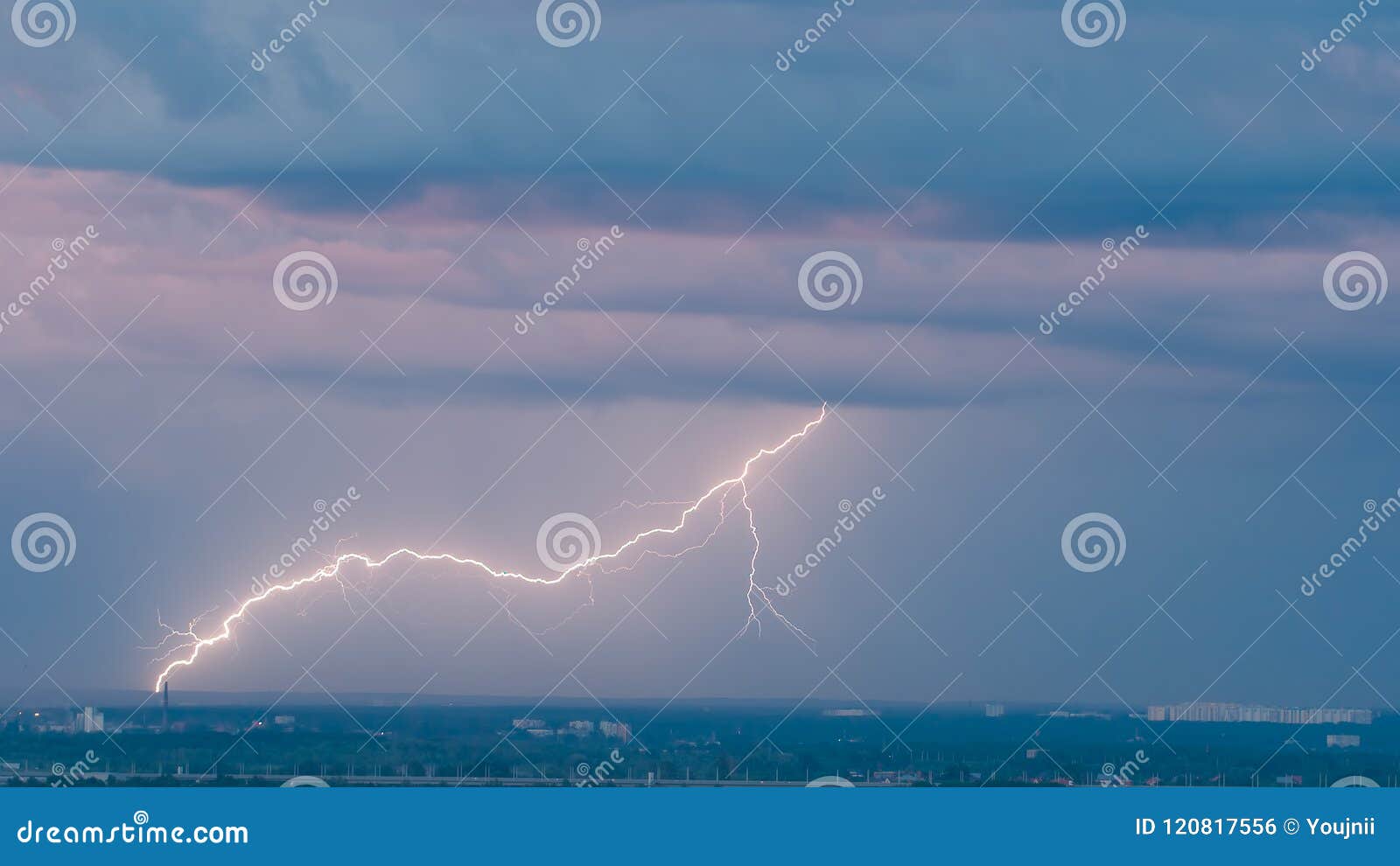 Flash of Lightning Over Town Stock Photo - Image of lightning, stormy ...