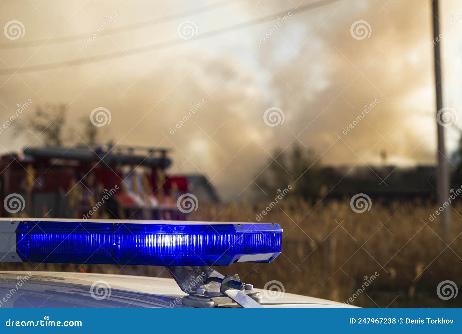 Flashing Beacon on the Background of a Fire and Fire Engines Stock ...