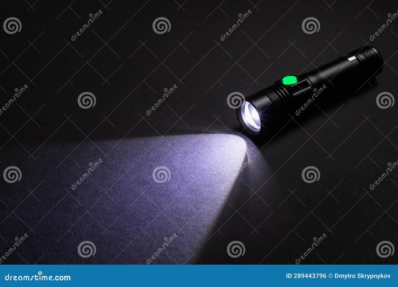 Flashlight and a Beam of Light in Darkness. a Modern Led Lamp with ...