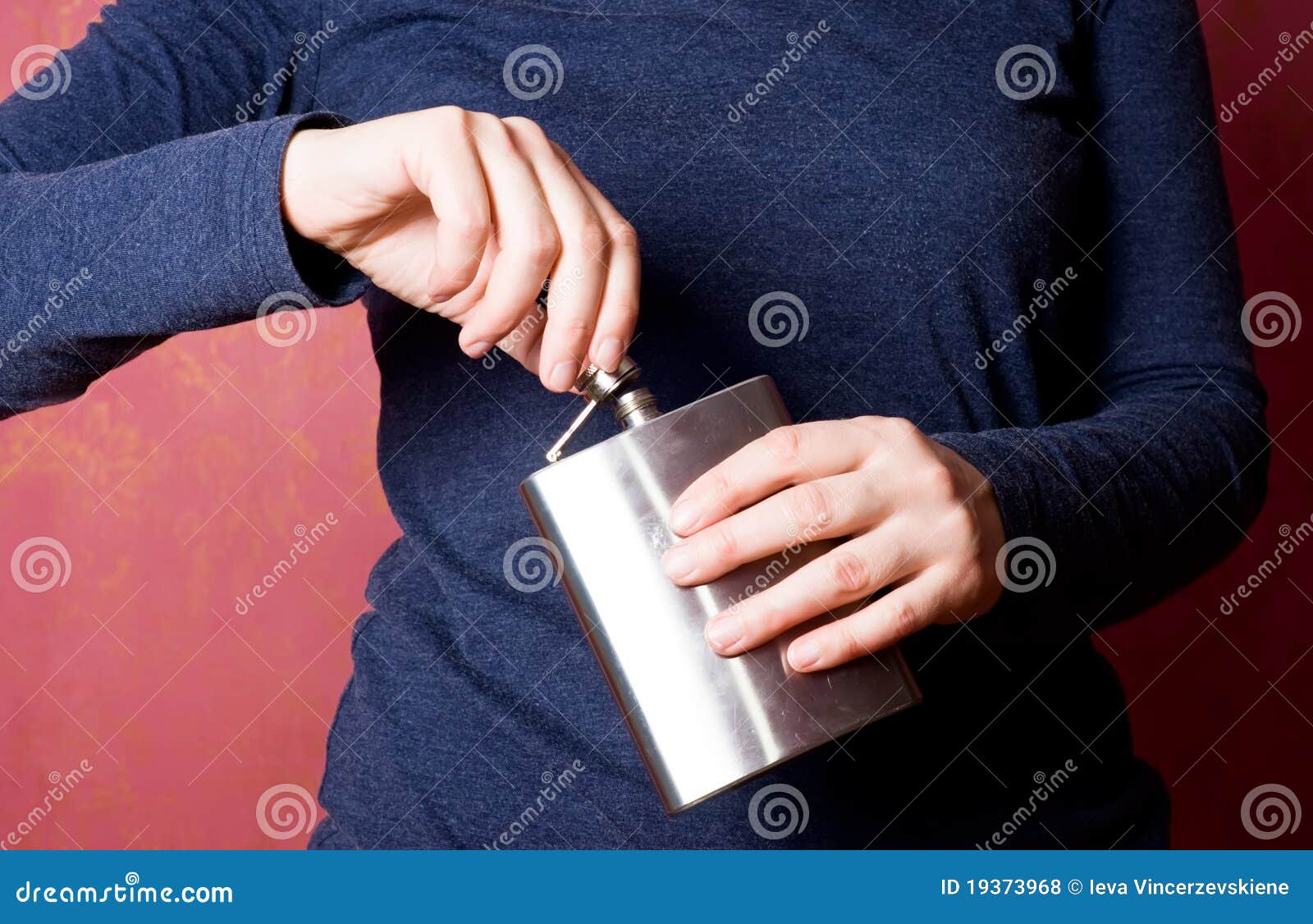 Flask in hands stock photo. Image of alcoholism, hold - 19373968