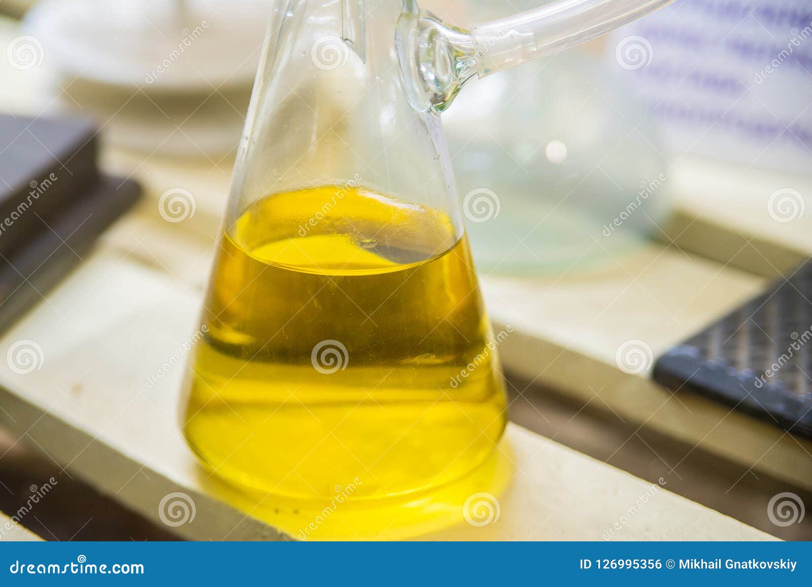Flask with Yellow Liquid in Industrial Laboratory Stock Photo - Image ...