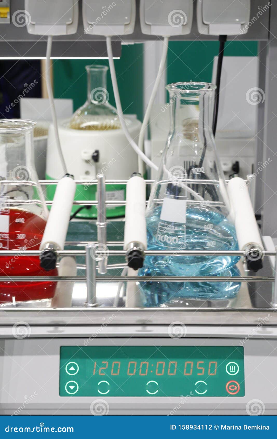 Flasks and Dishes with Solutions Ready for Research Activities Stock ...