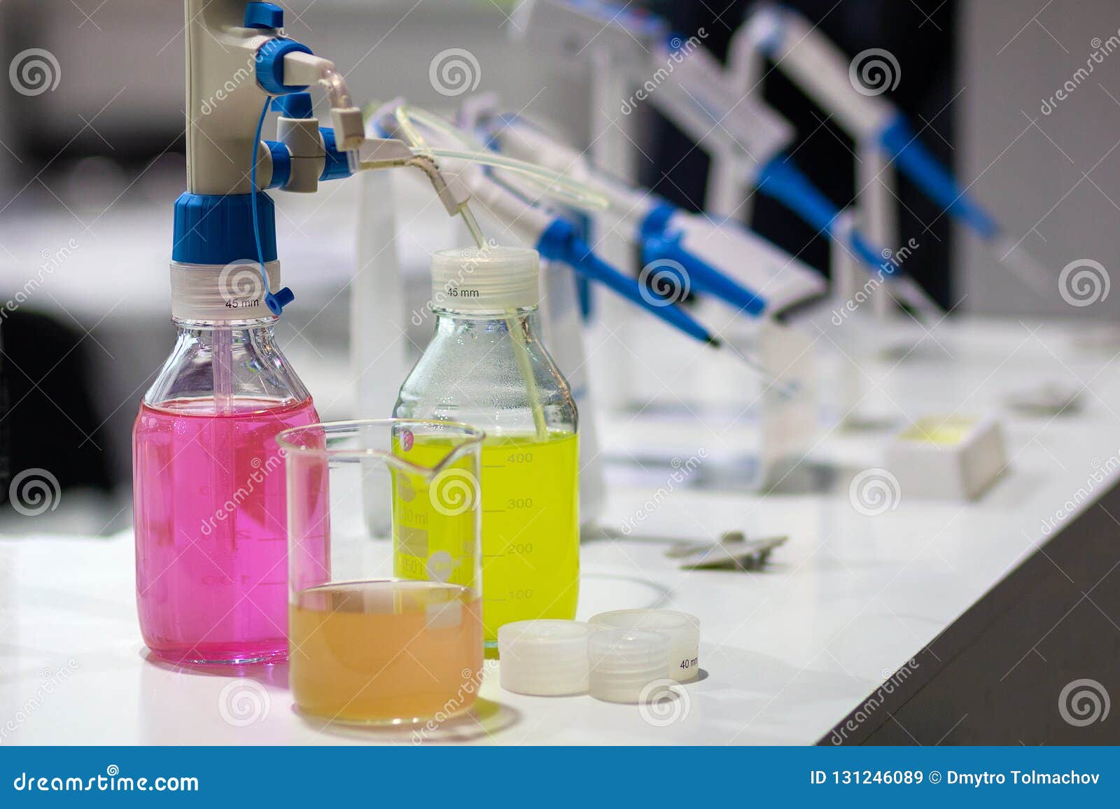 Flasks with a Multi-colored Solution on the Table in a Medical ...