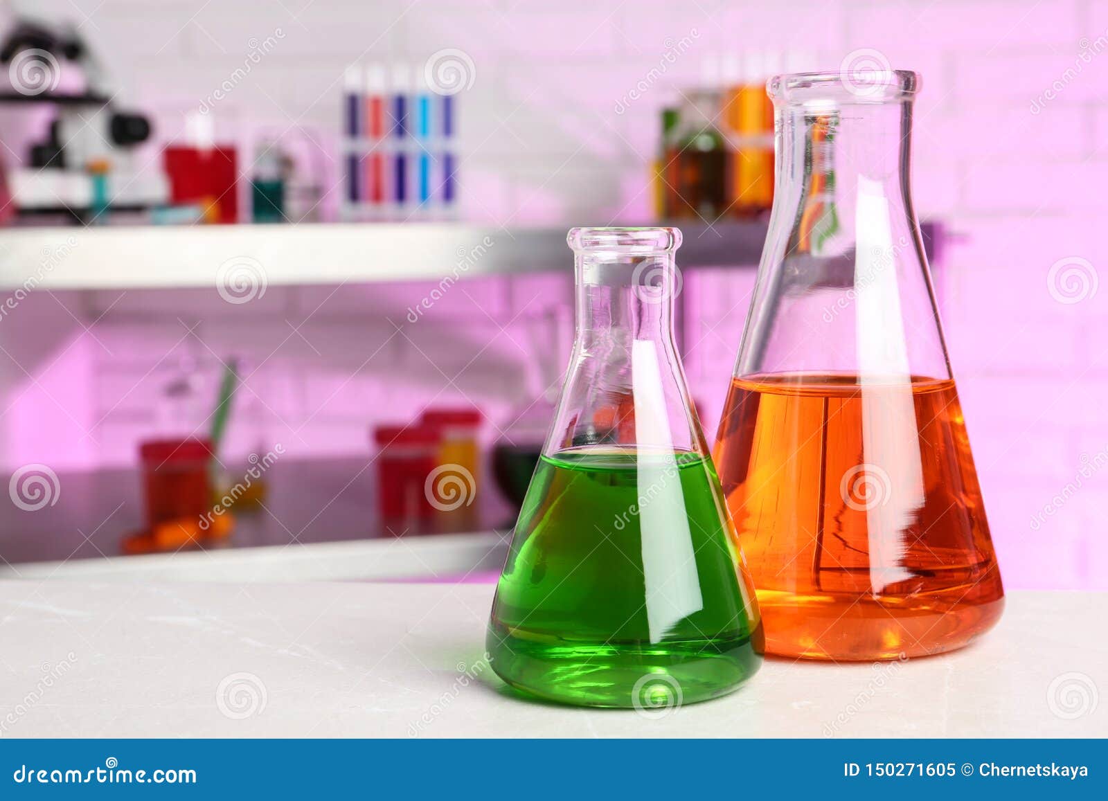 Flasks with Samples on Table in Chemistry Laboratory Stock Image ...