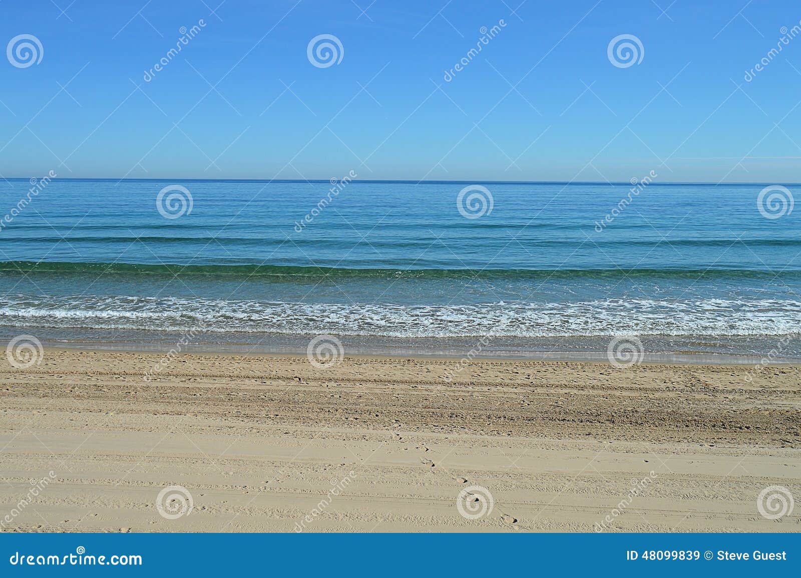 A Flat Blue Sea stock image. Image of mediterranean, sand - 48099839