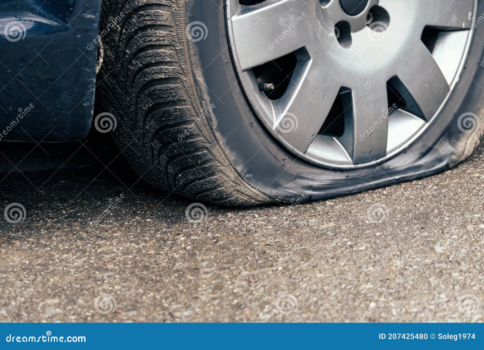 Flat Car Tire Close Up, Punctured Wheel Stock Photo - Image of rainy ...