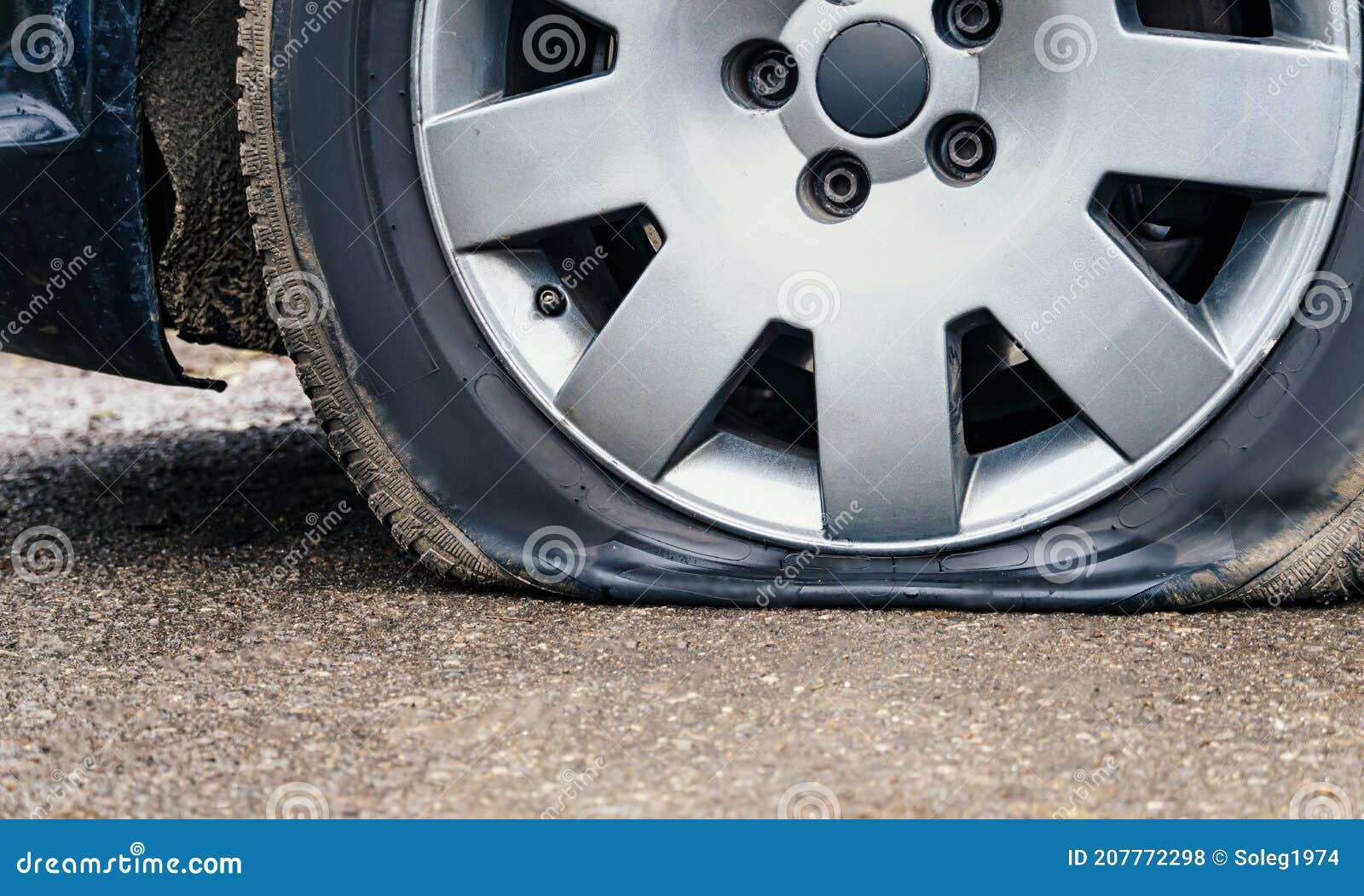 Flat Car Tire Close Up, Punctured Wheel Stock Photo - Image of damaged ...