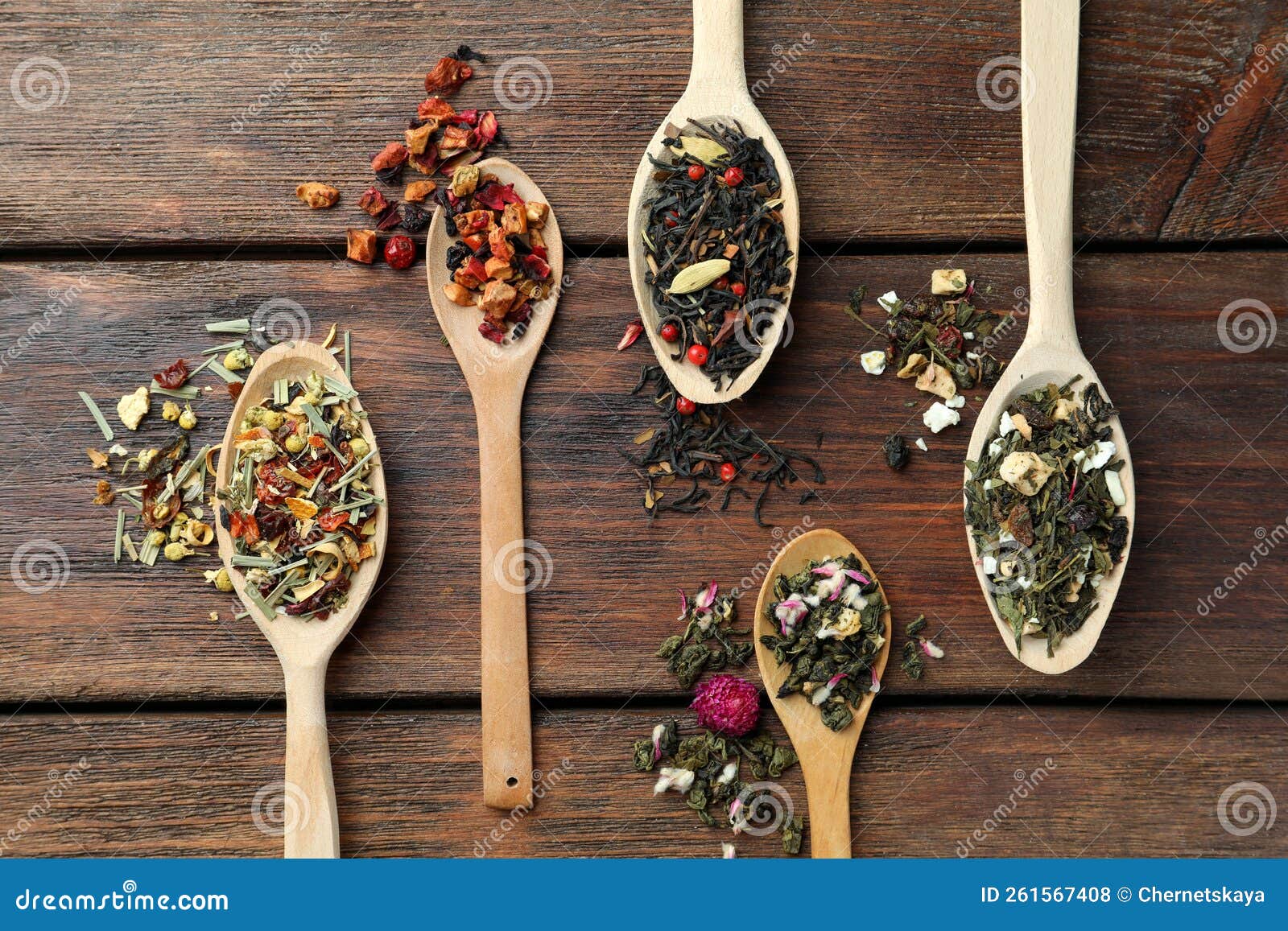Flat Composition with Spoons of Dried Herbal Tea Leaves on Wooden Table Stock Photo - Image of ...