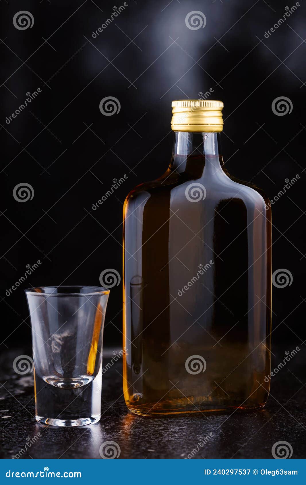 Flat,glass brandy bottle stock image. Image of object - 240297537