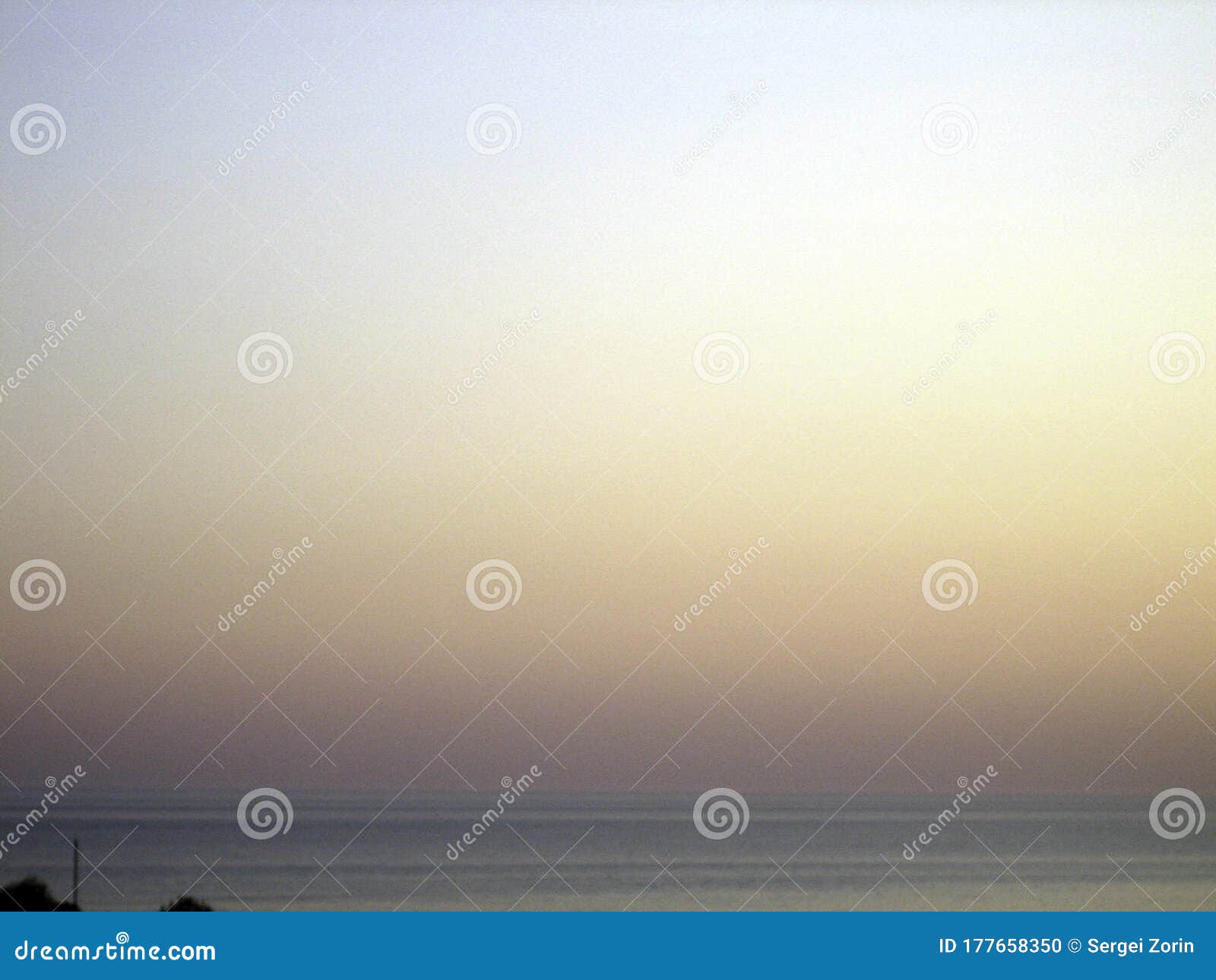 A Flat Horizon between the Sky and the Sea at Sunset on a Clear Day ...
