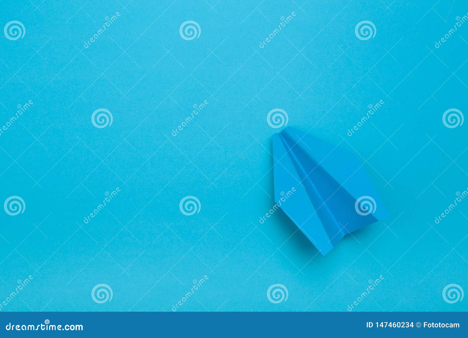 Flat Lay of Colour Paper Plane on Blue Background with Text Space Stock ...