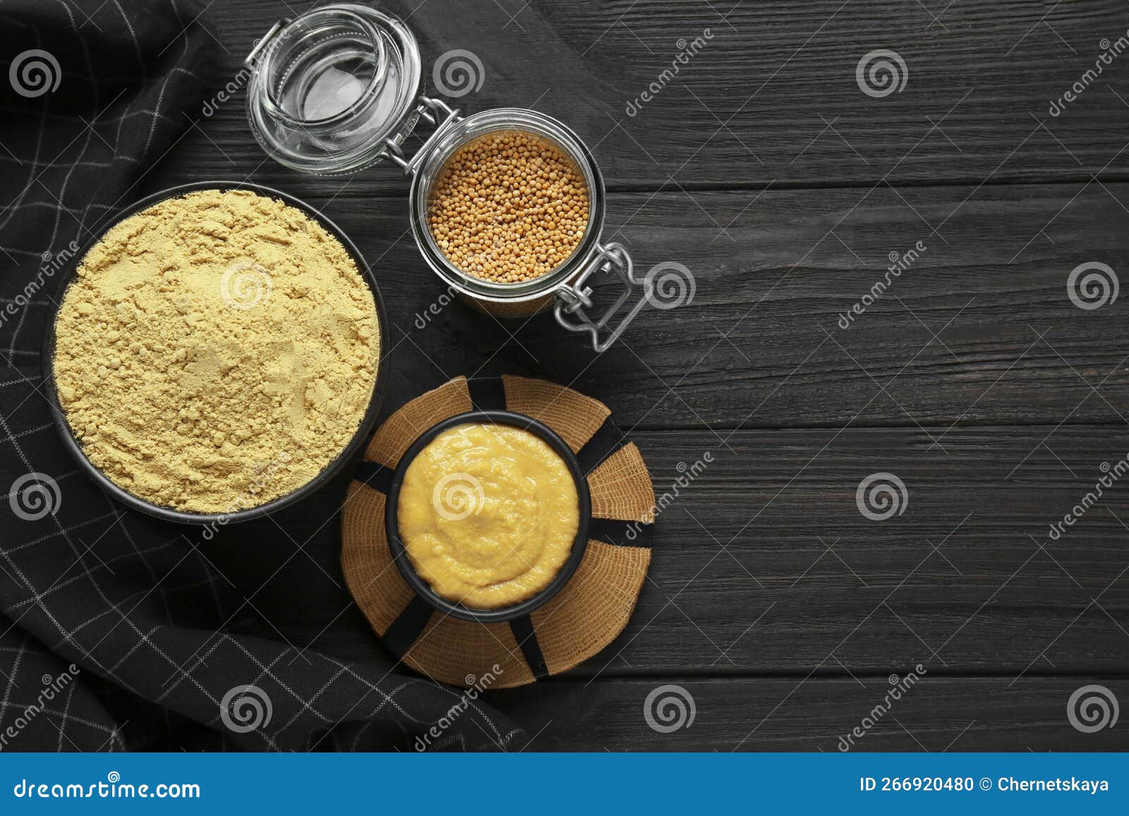Flat Lay Composition with Aromatic Mustard Powder and Seeds on Black ...