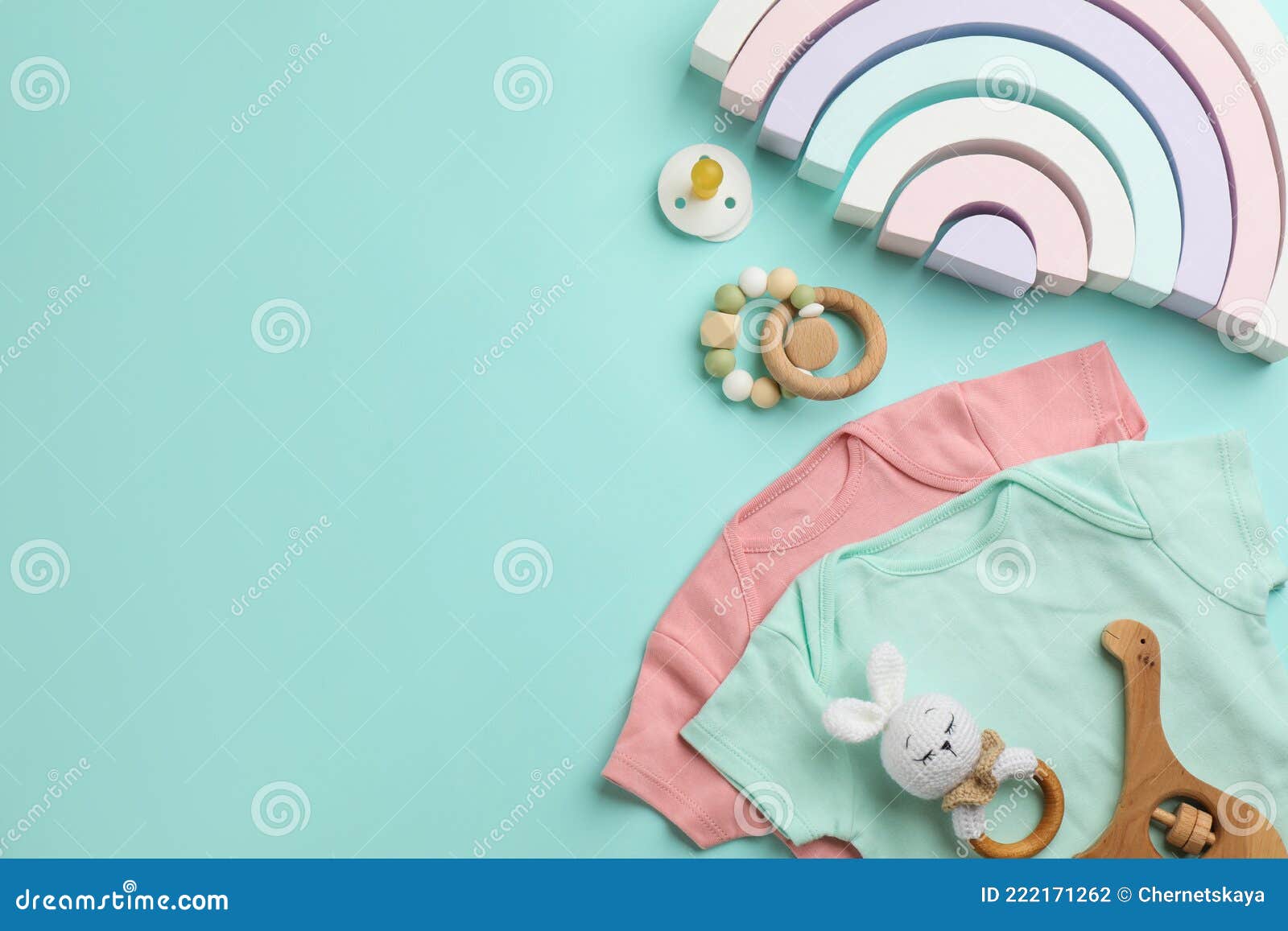 Flat Lay Composition with Baby Clothes and Accessories on Blue ...