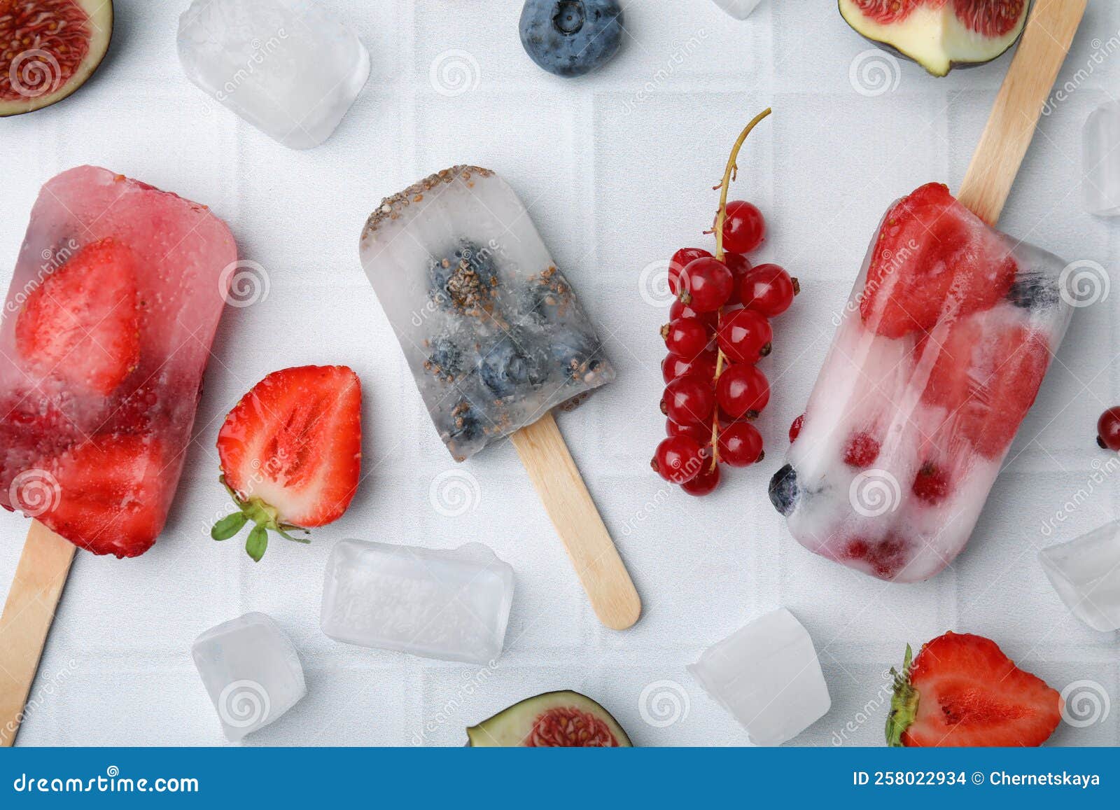 Flat Lay Composition with Berry Ice Pops on Light Table Stock Photo ...