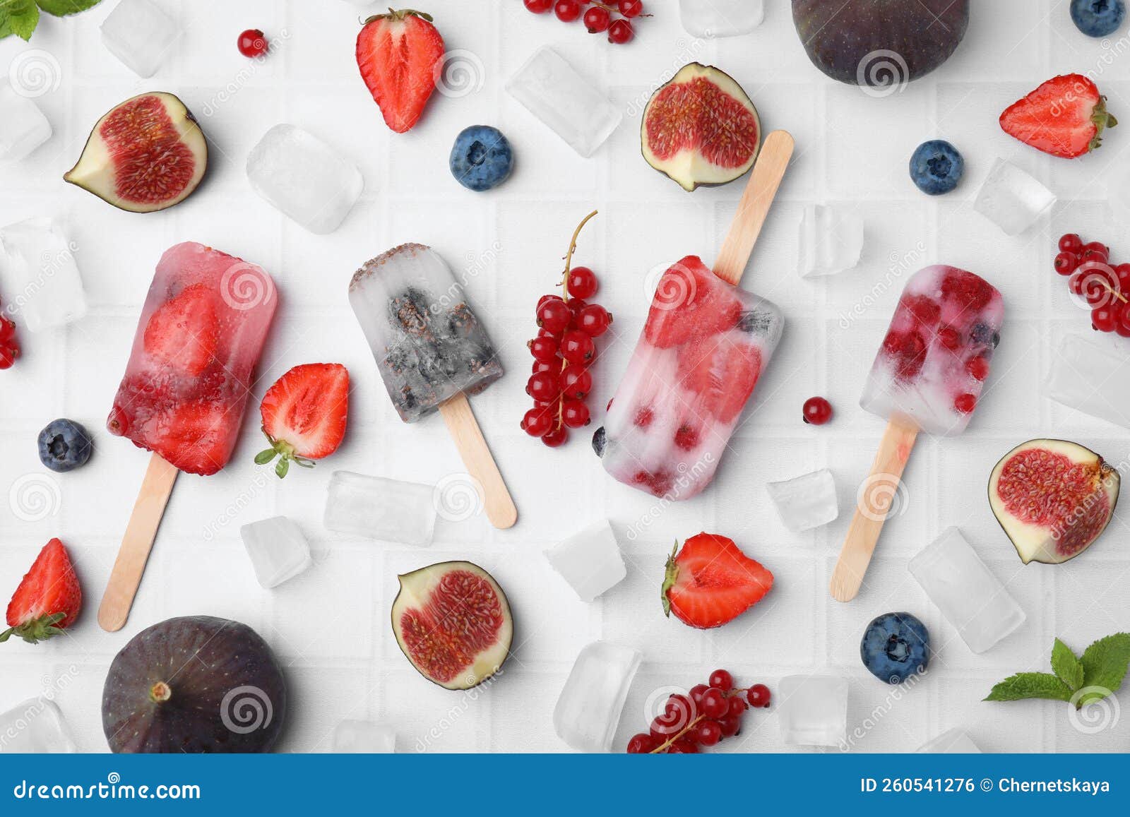 Flat Lay Composition with Berry Ice Pops on Light Table Stock Photo ...
